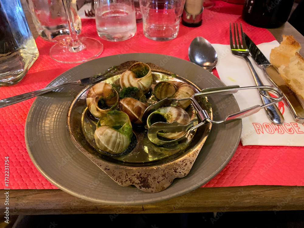Escargot snails in a French restaurant Stock Photo | Adobe Stock