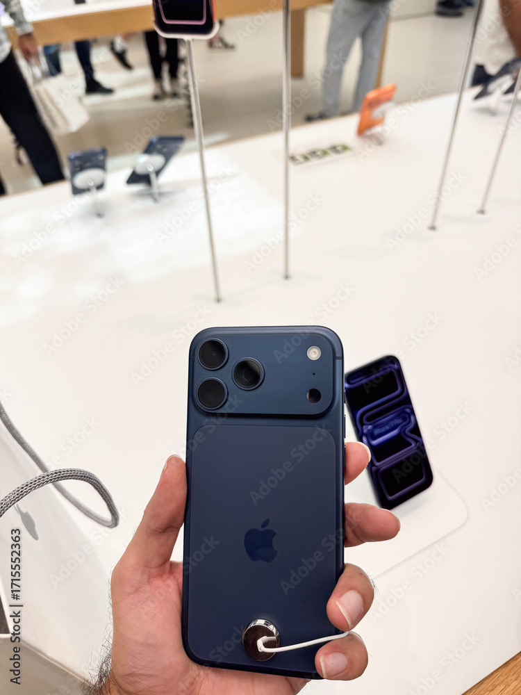 iPhone 17 pro models on display at the Apple Store in Mall of the ...