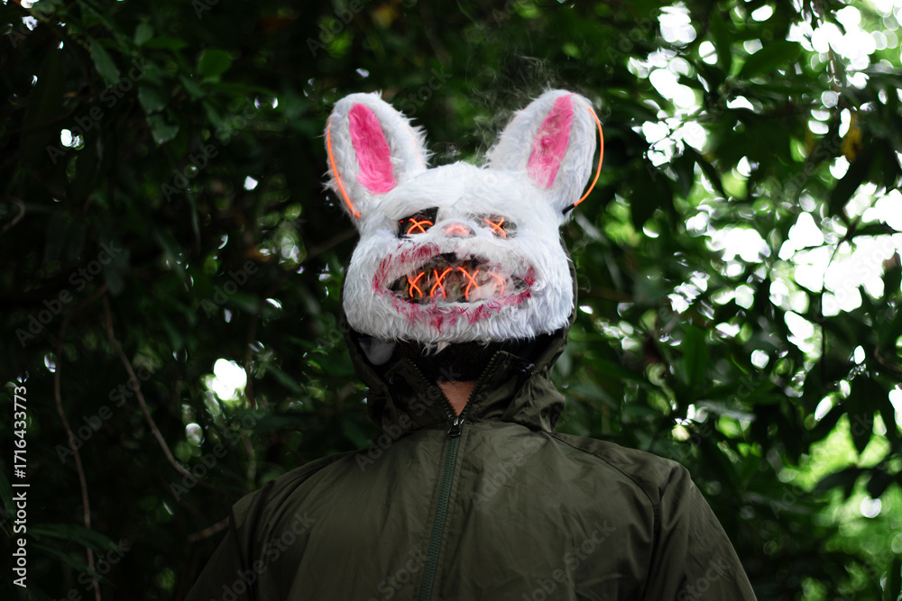 Spooky Halloween bunny mask glowing red with smoke seeping from eyes ...