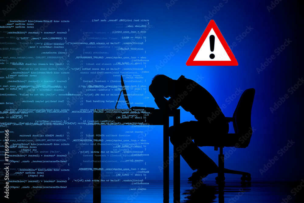 Stressed employee silhouette leaning on desk with warning sign and ...