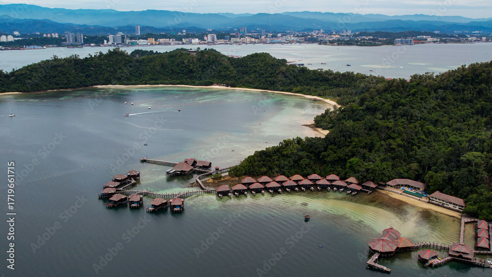 Aerial drone view of overwater villas and jetties on Gaya Island in ...