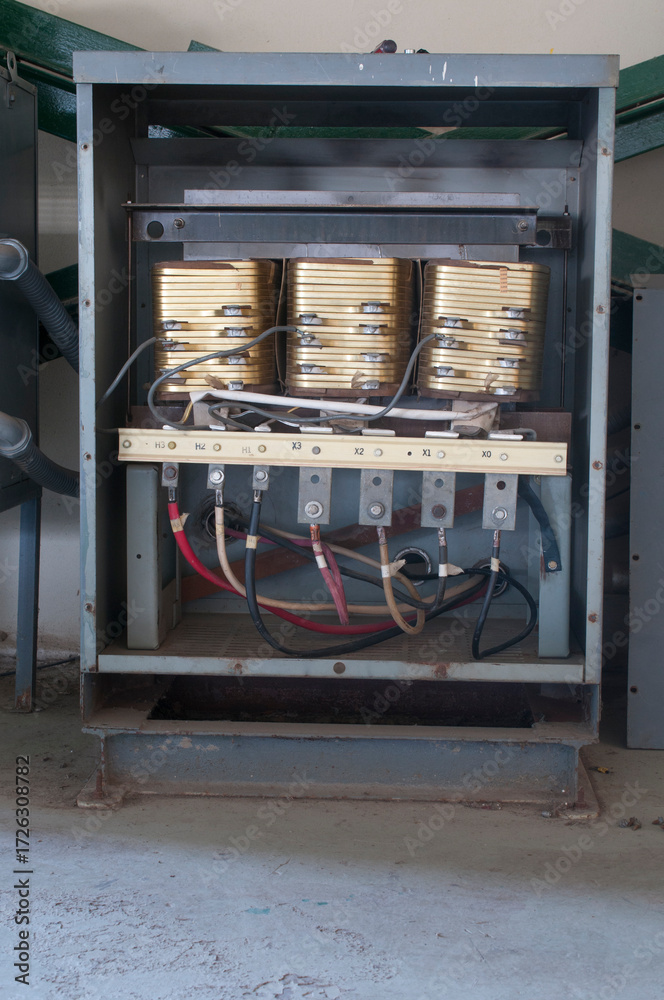 30 kVA three-phase dry-type electrical transformer, uncovered, showing ...