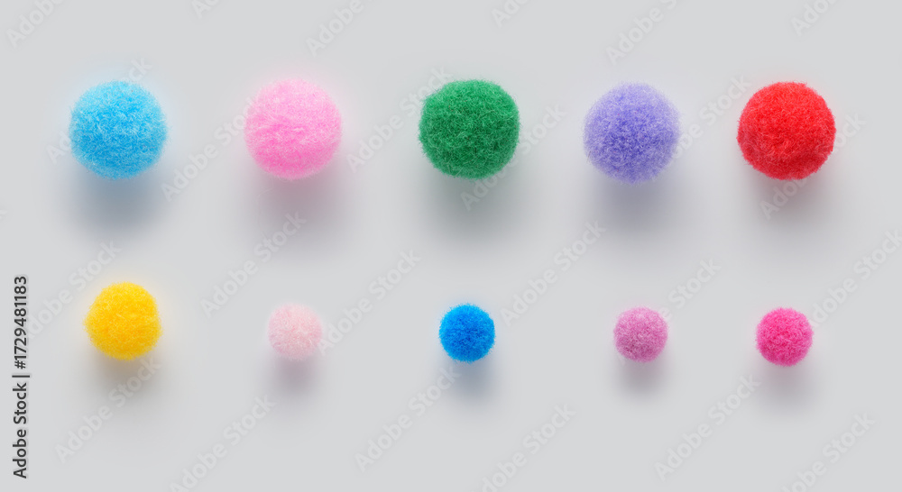 Colorful fluffy pom poms on white background. Creative handmade for ...