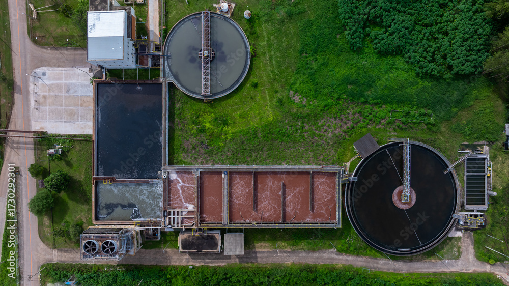 Aerial view circular clarifier tank at wastewater treatment plant ...