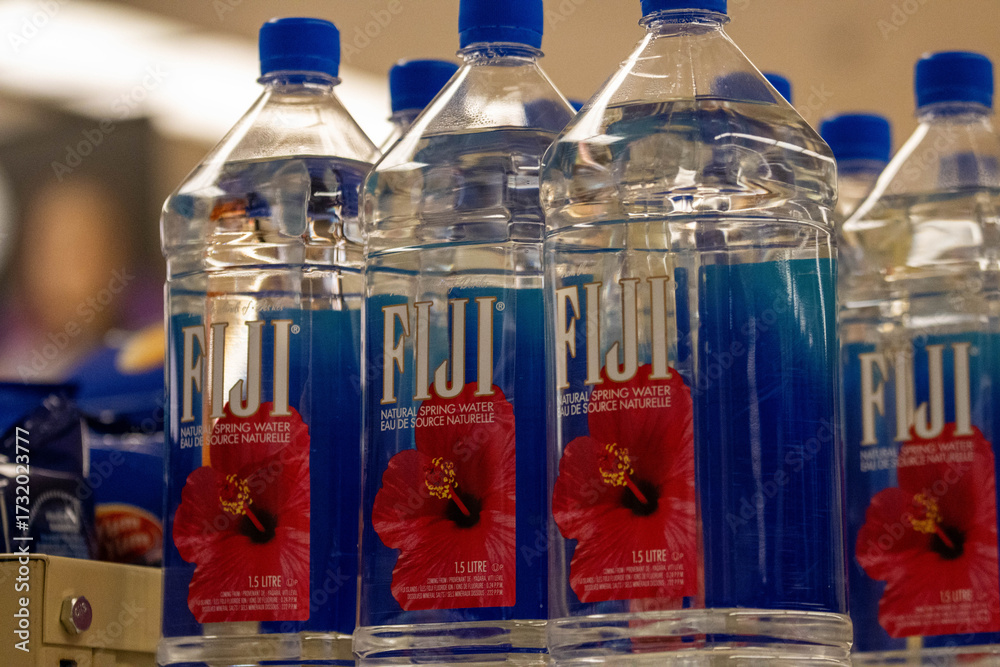 Canada, 14 September 2025 : Rows of Fiji natural spring water bottles ...