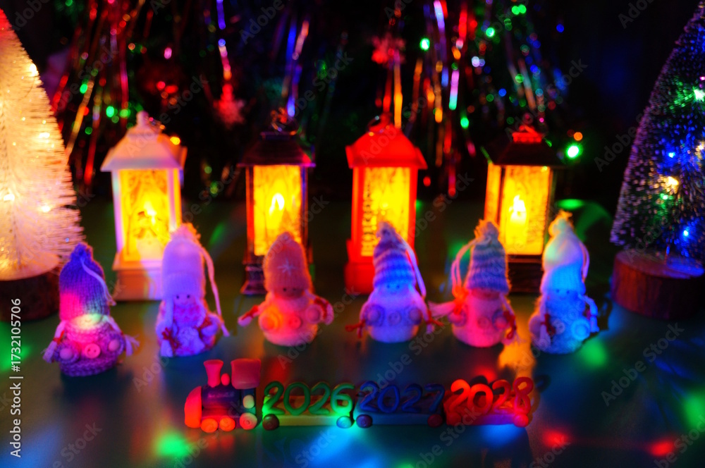 New Year's decoration. A toy train with the dates 2026, 2027, 2028 and ...