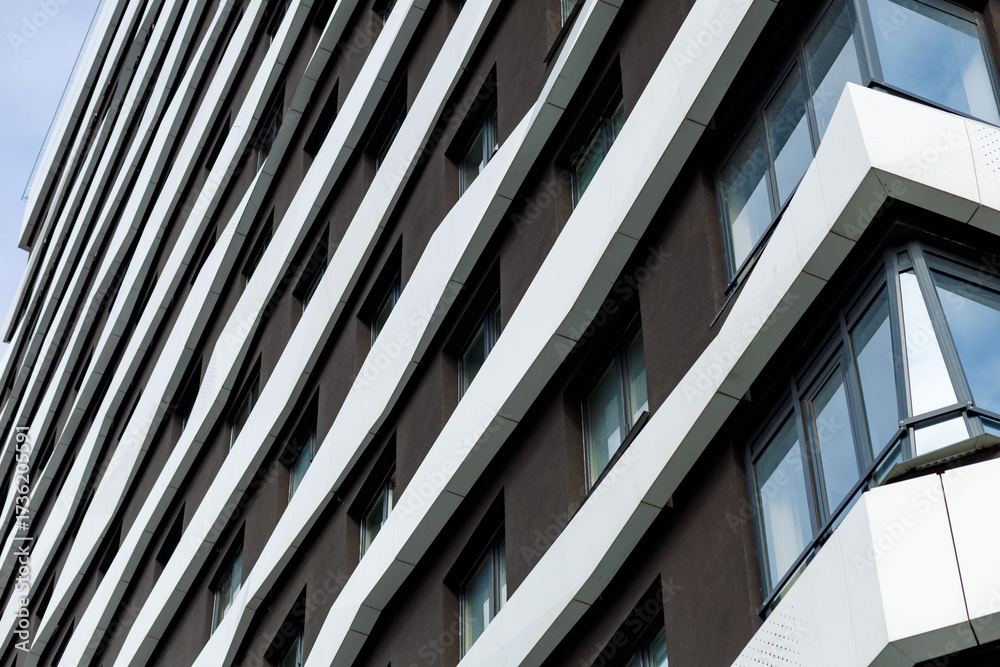 The building's façade features a contemporary design using aluminum ...