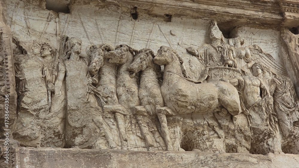 Rome, Italy - 13 January 2025. A relief on the Arch of Titus shows ...