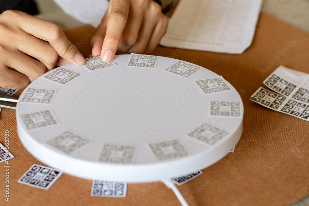 Photogrammetry setup with ArUco markers on a turntable for 3D scanning ...
