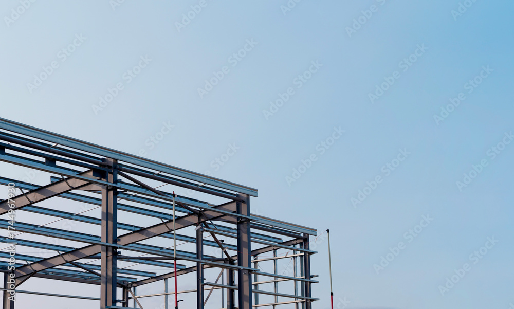Photo Stock Steel beams form the skeletal steel frame structure of a ...