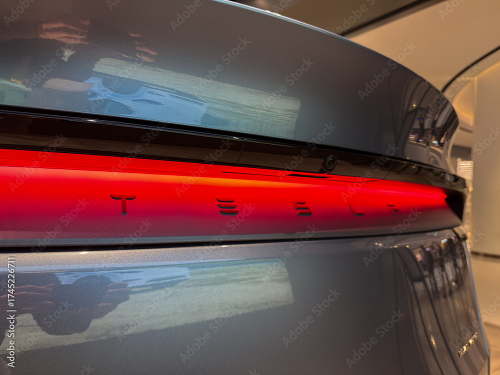 Bangkok, Thailand - July 1, 2025: Close up of Tesla logo and taillight ...