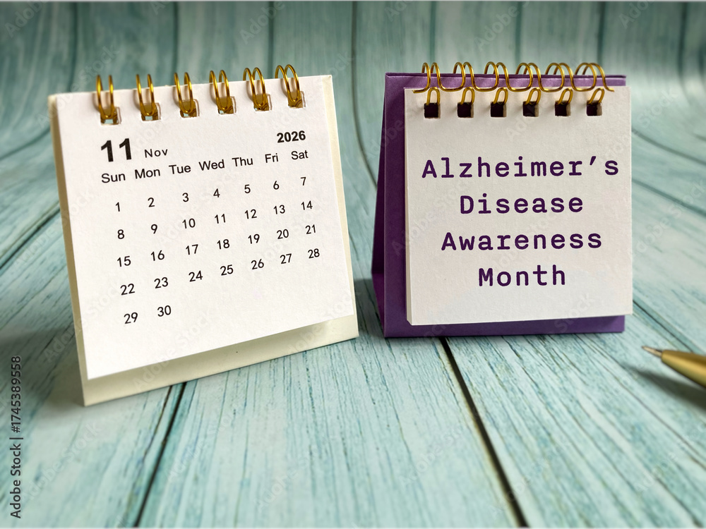 November 2026 calendar page beside a note card with text Alzheimer’s ...