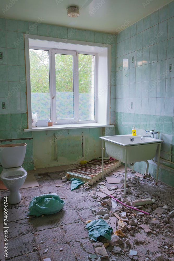 Foto de Stock bathroom shows signs neglect and decay, with missing ...