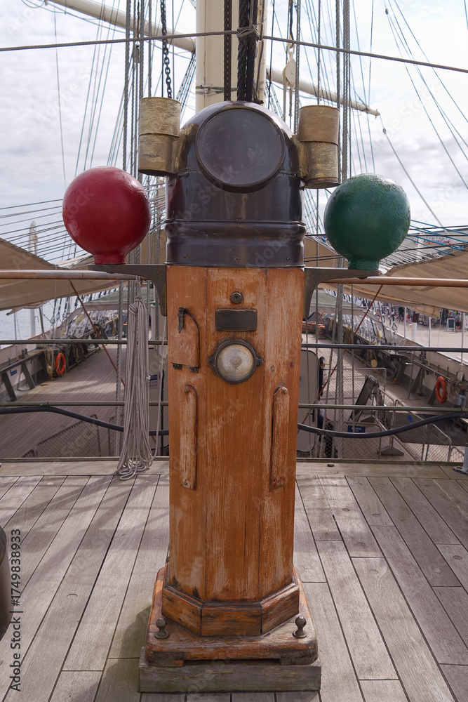 Historic ship navigation light on the deck with red and green lenses ...