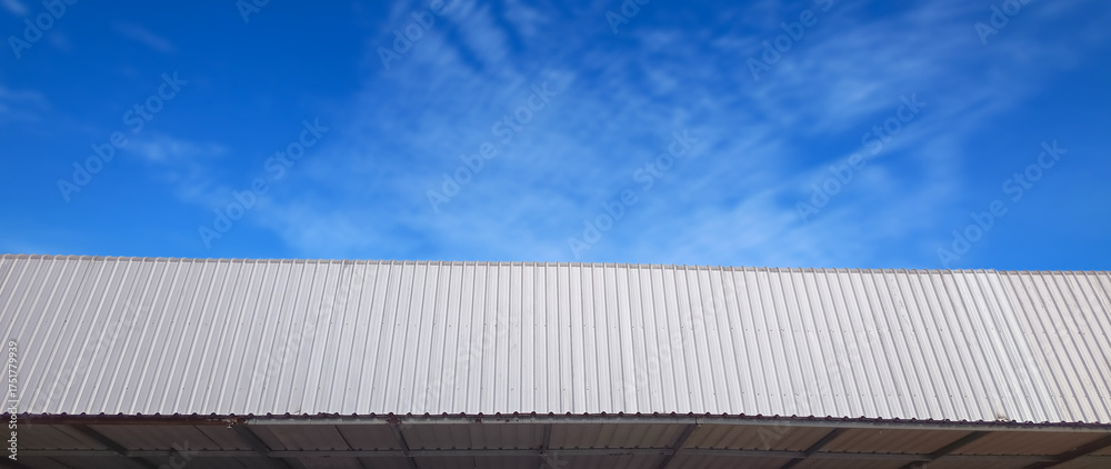 Metal sheet roof curve on blue sky. Modern construction, Metal ribbed ...