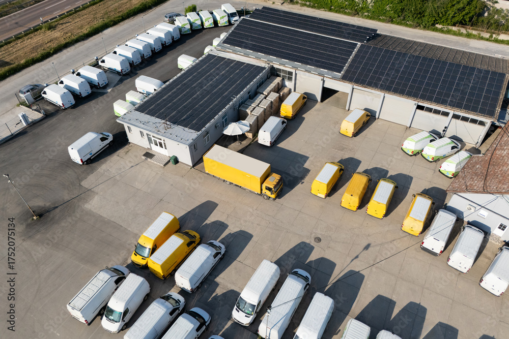 Electric delivery vans and trucks hub using renewable energy. Fleet of ...