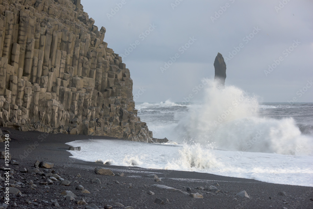 Photo Stock View of basalt columns meet the crashing waves of the ...