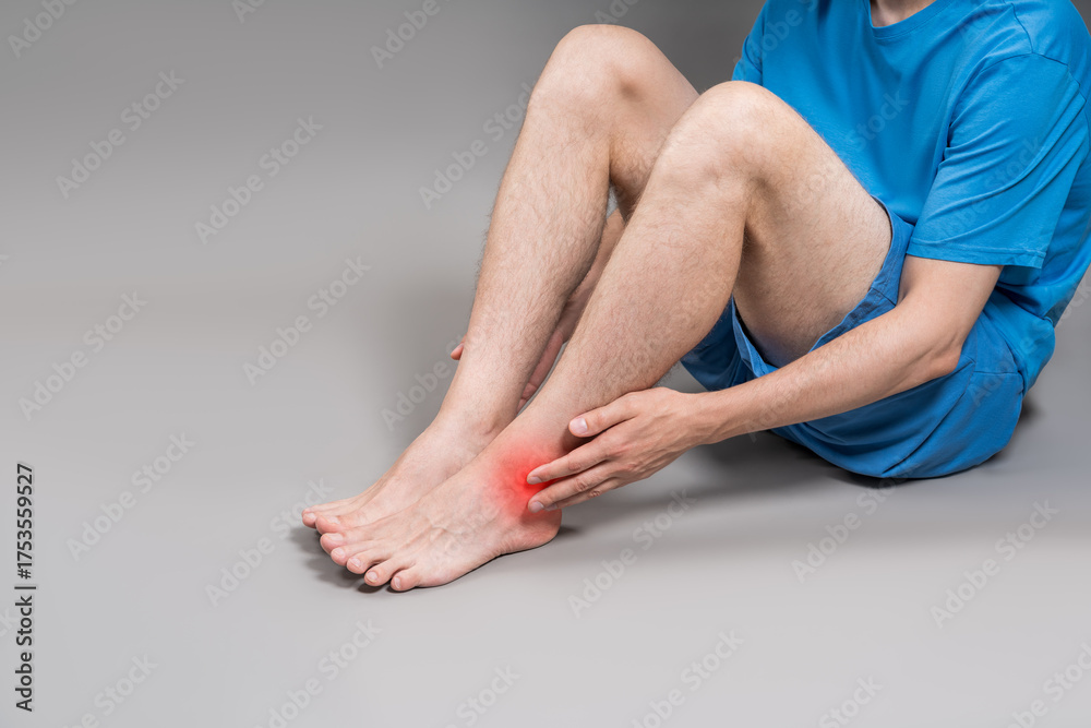 Achilles tendon injury, joint inflammation, foot pain, man suffering ...