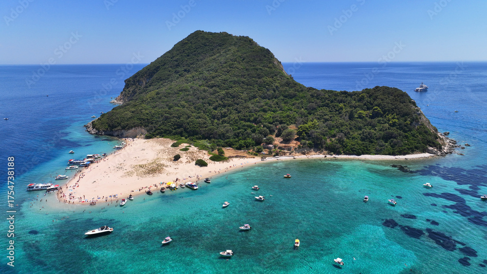 Aerial drone photo of scenic small paradise island of Marathonisi or ...