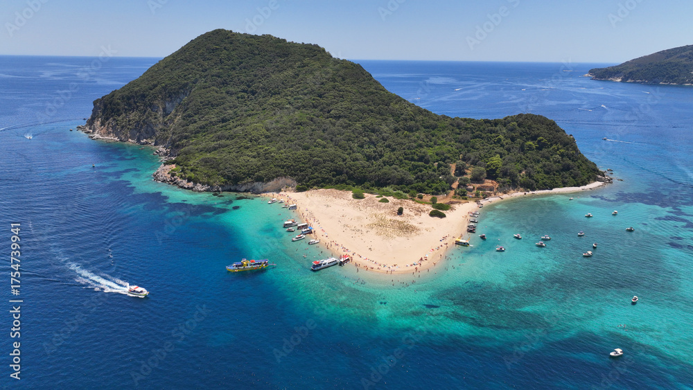Aerial drone photo of scenic small paradise island of Marathonisi or ...