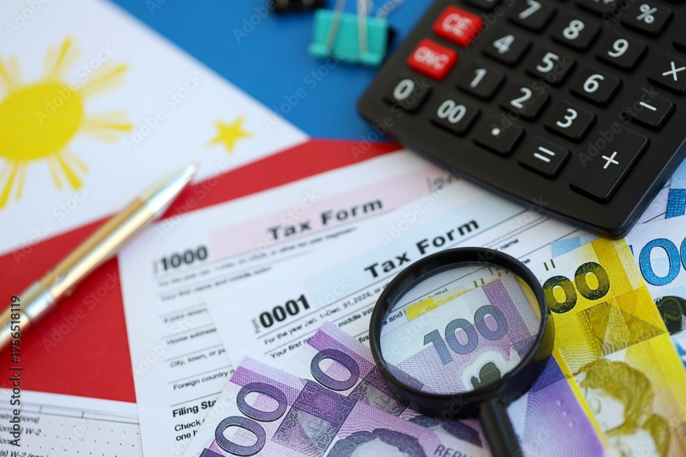 Photo Stock Philippines peso money bills and calculator with tax form ...