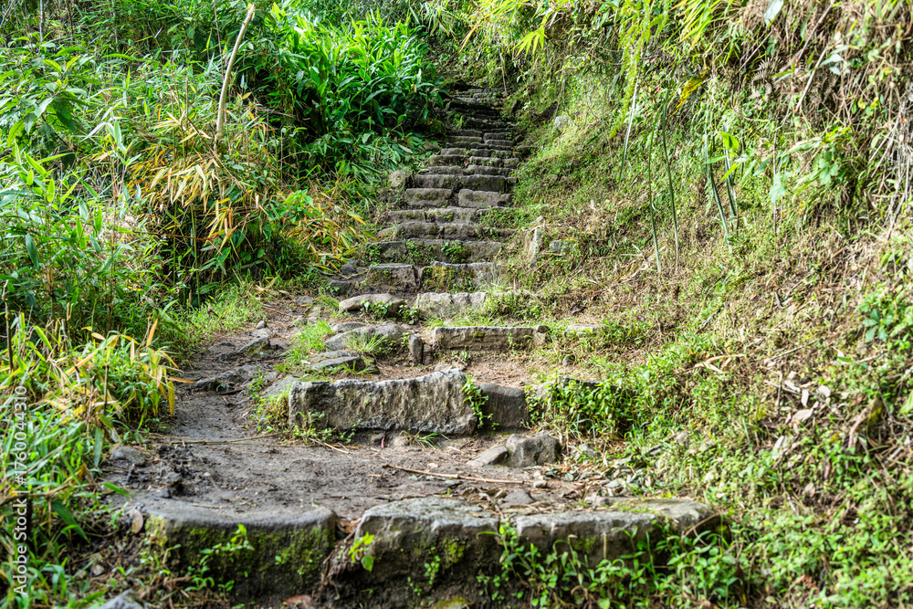 View with the steep stone steps from the pedestrian path from Aguas ...