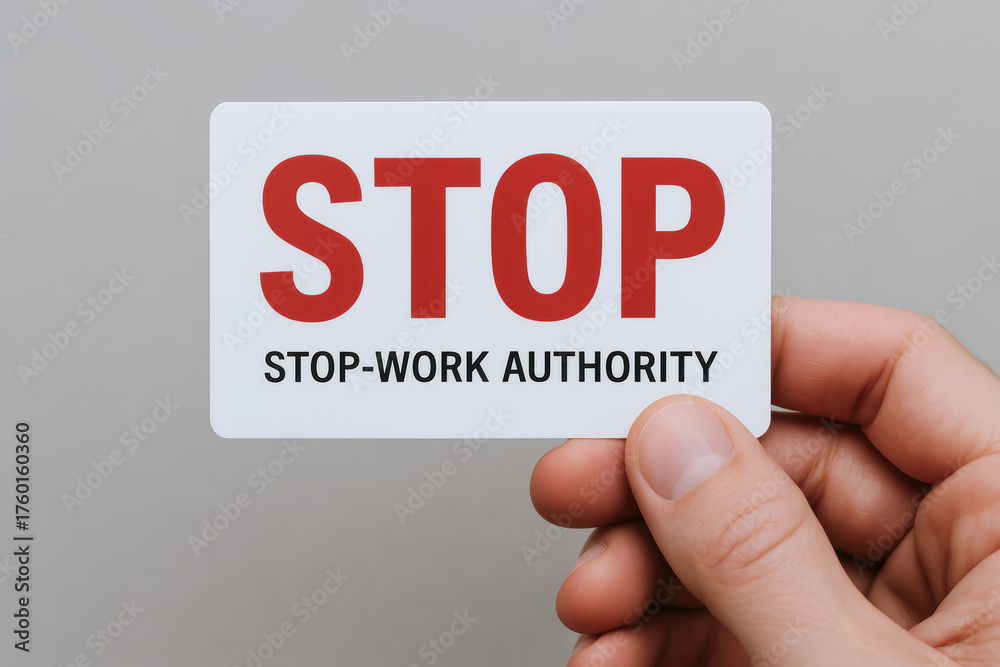 Stop prevention safety card held by hand promoting accident prevention ...