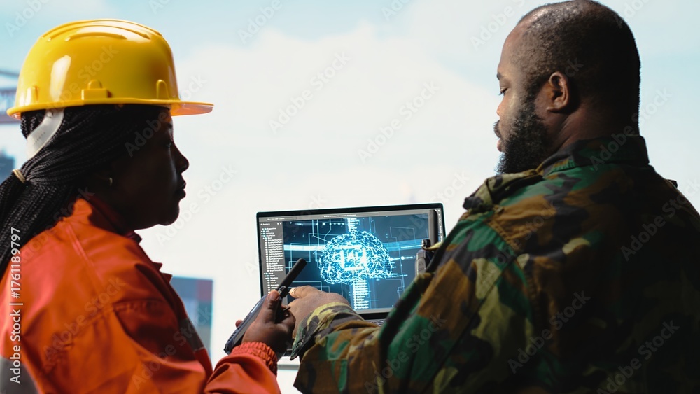 Close up of military unit and technician on offshore rig using ...