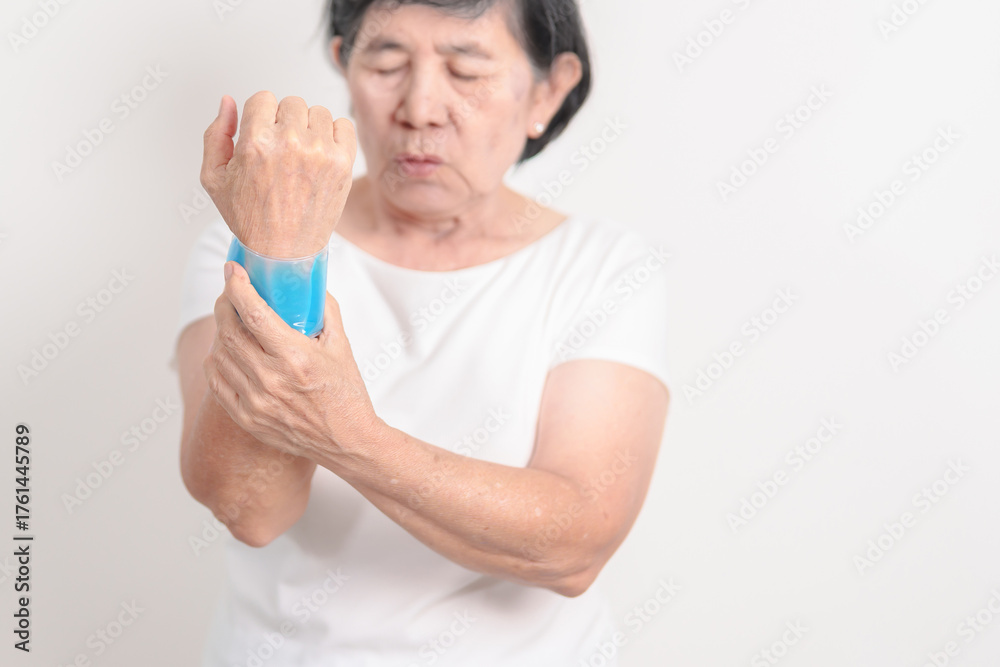 Elderly Woman having wrist pain and Edema with Cold Gel pack for Carpal ...