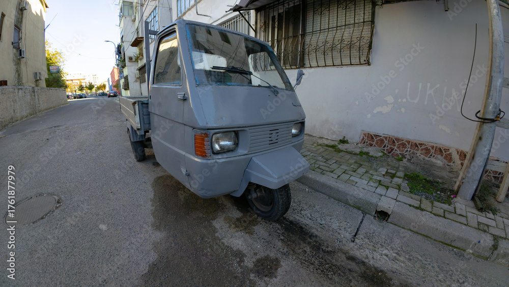 Piaggio three-wheeled pickup truck on the street of Durres, Albania 18. ...