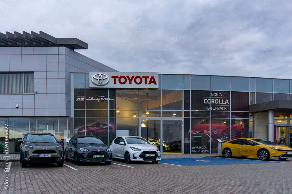 Toyota car dealership with new vehicle models outside the building ...