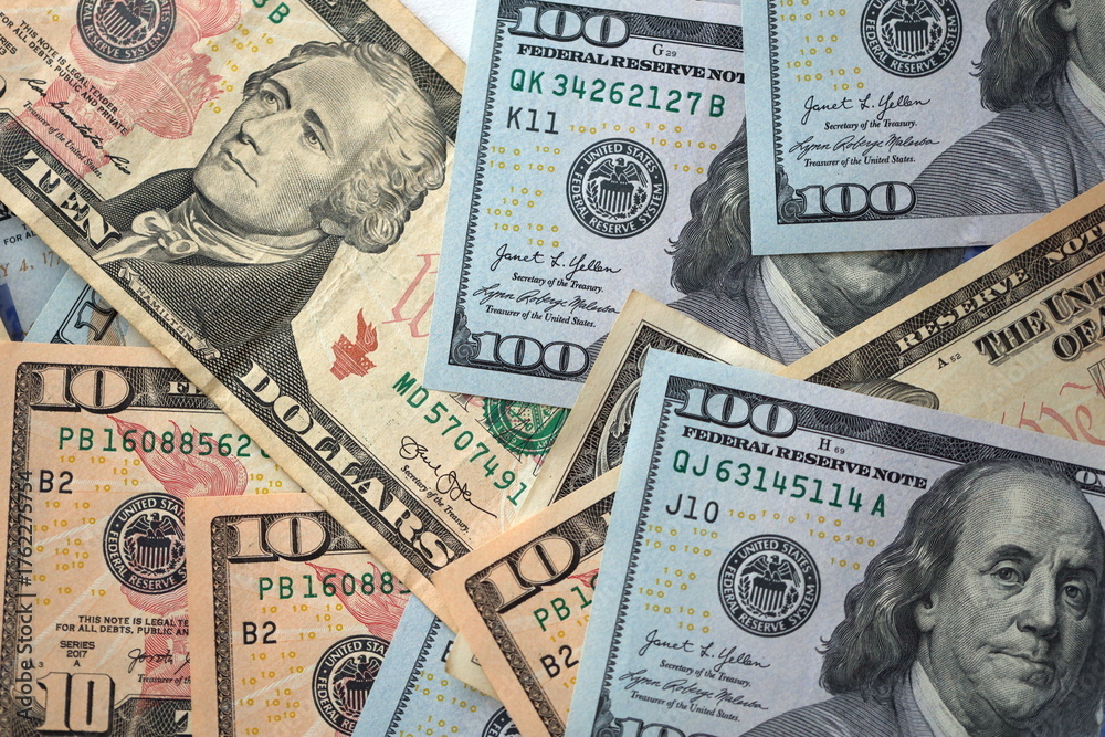 Big amount of different dollar bills close up. Hundred fifty twenty ten ...