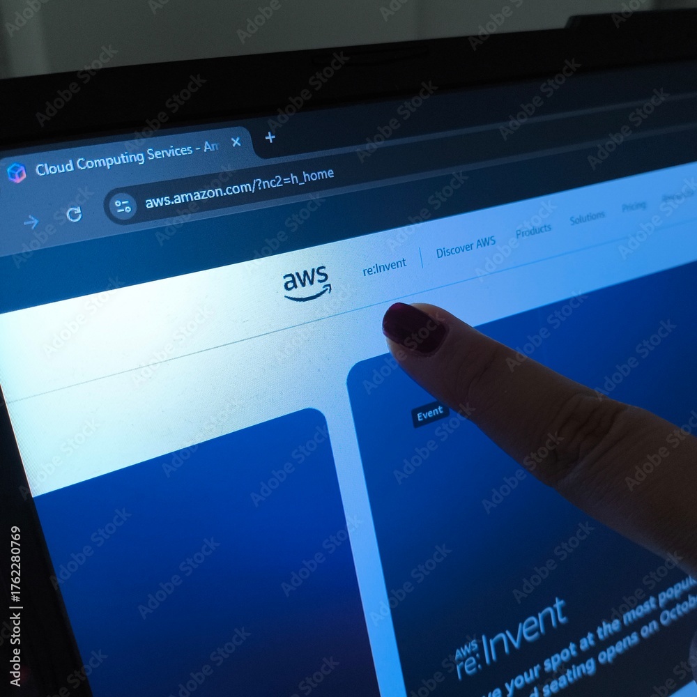 Rudny, Kazakhstan - October 20, 2025. A finger points to aws on a ...