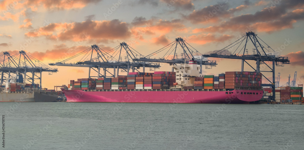 Logistics and container loading by large barges by sea in a harbor full ...