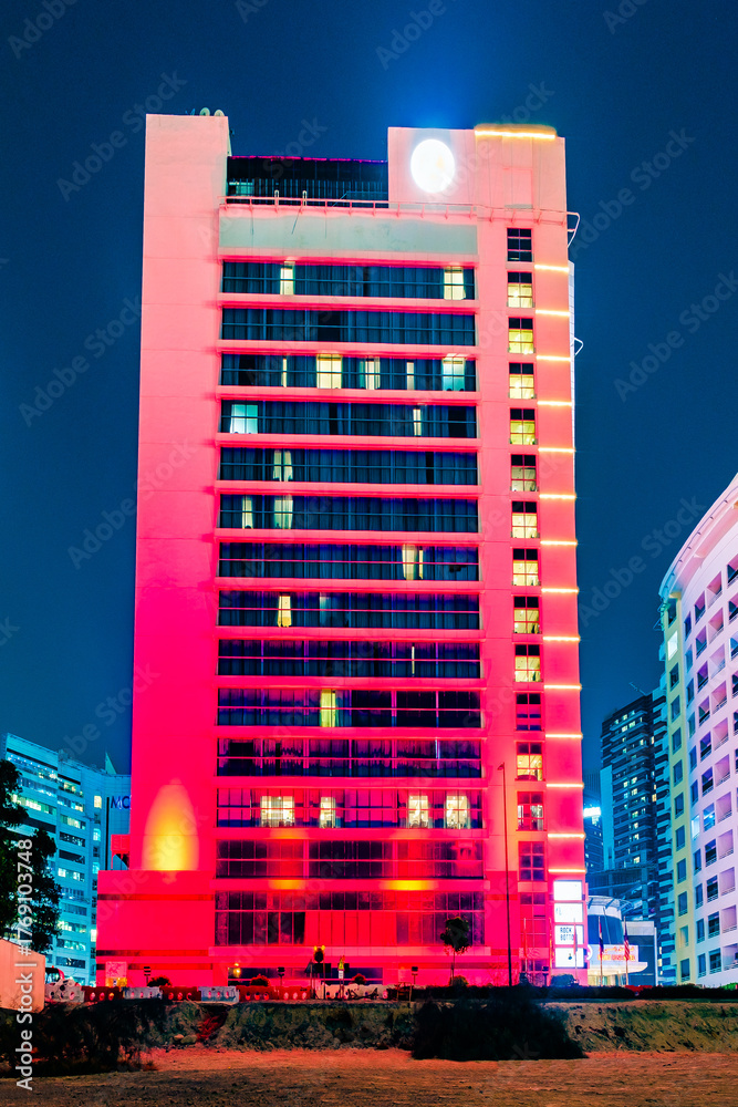 Dubai, UAE – october 03, 2025: Ramee Rose Hotel at night, vertical ...