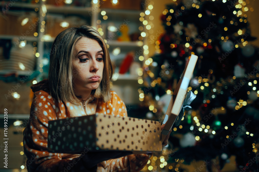 Sad Woman Opening the Lid of a Christmas Present Box. Unhappy lady ...