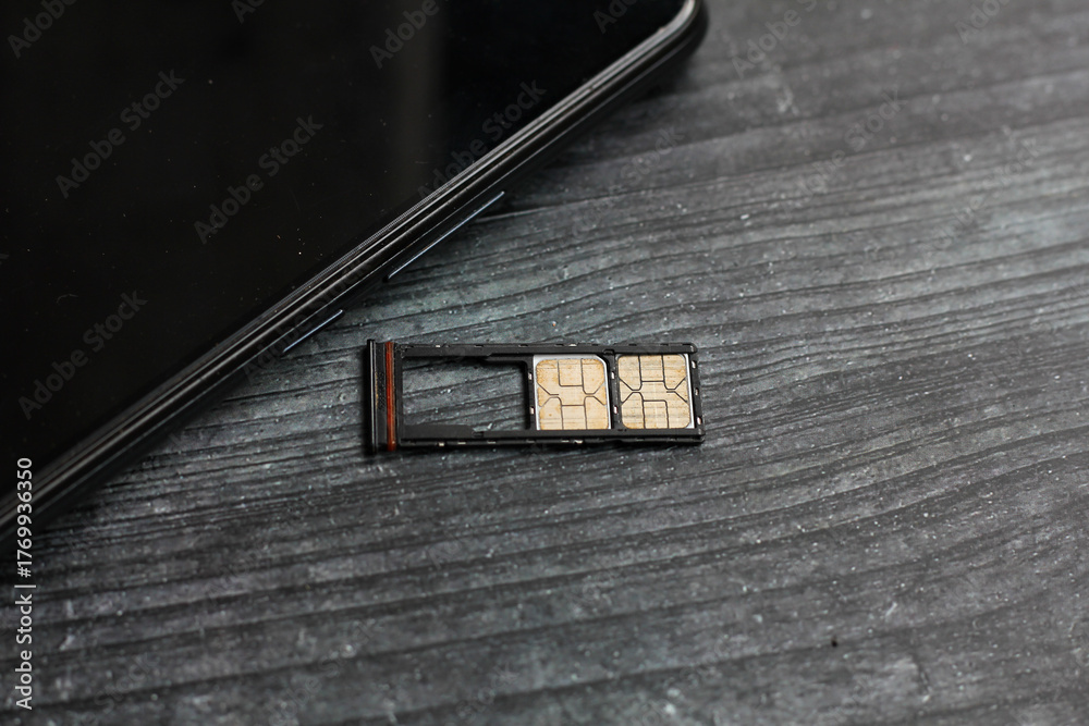 dual nano SIM card smartphone installed doing card change isolated ...
