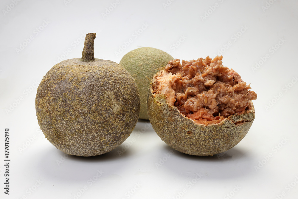 Hard shelled rare exotic fruit sour tangi wood apple kod bel on white ...