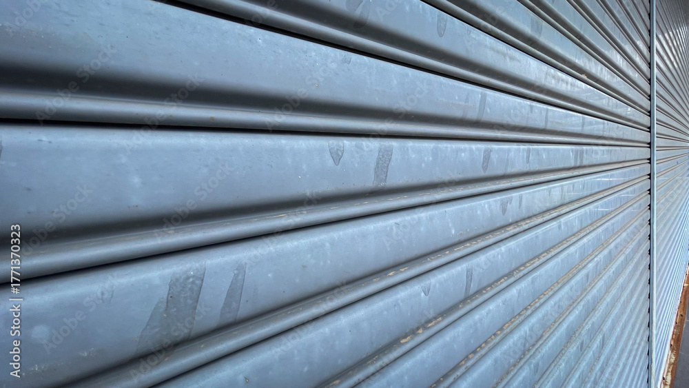Texture background of a steel sliding door, designed to move up and ...