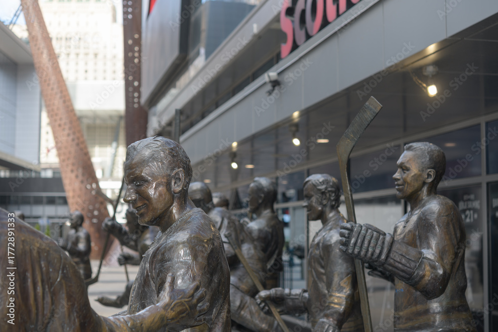 bronze hockey player statues at Maple Leaf Square, known as Legends Row ...