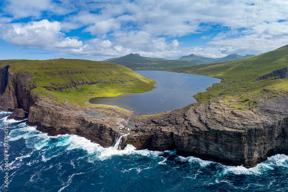 aerial view of Sorvagsvatn Lake and Bosdalafossur Waterfall on Vagar ...
