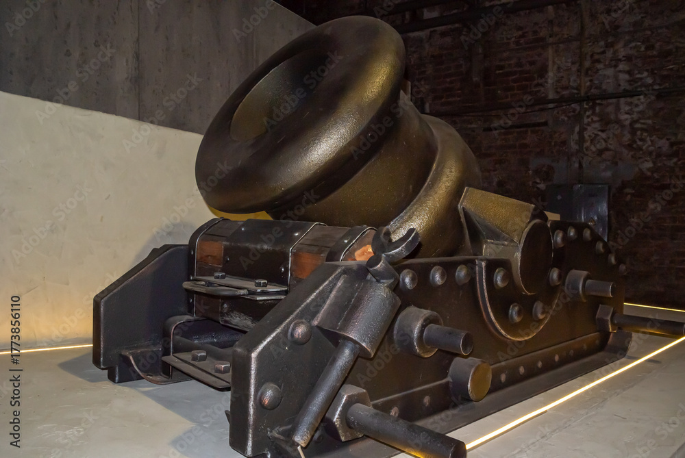 An ancient ship's mortar. An artillery piece with a short barrel ...