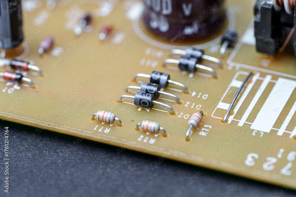 Electronic circuit board with various components like resistors and ...