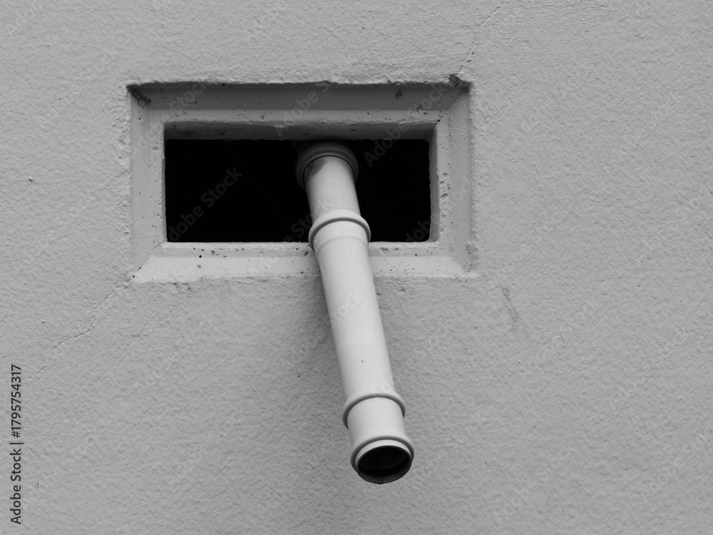 PVC ventilation pipe, which also protrudes from the rear wall of a ...