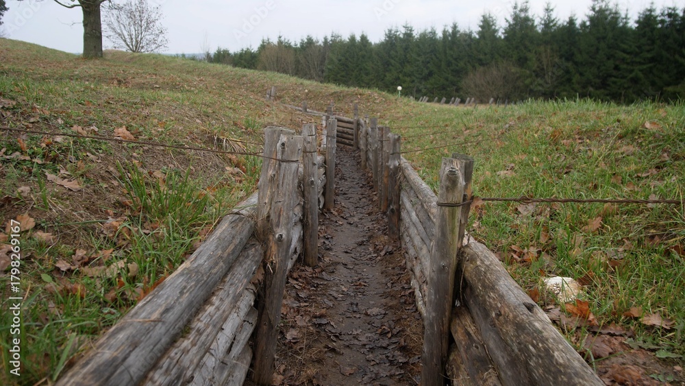 trail section being stabilized, restoration efforts involve timber ...