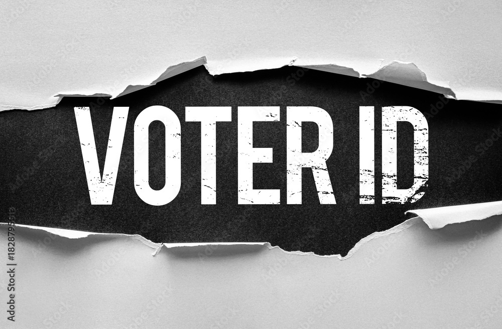 Word VOTER ID revealed behind torn paper on a background. Political ...