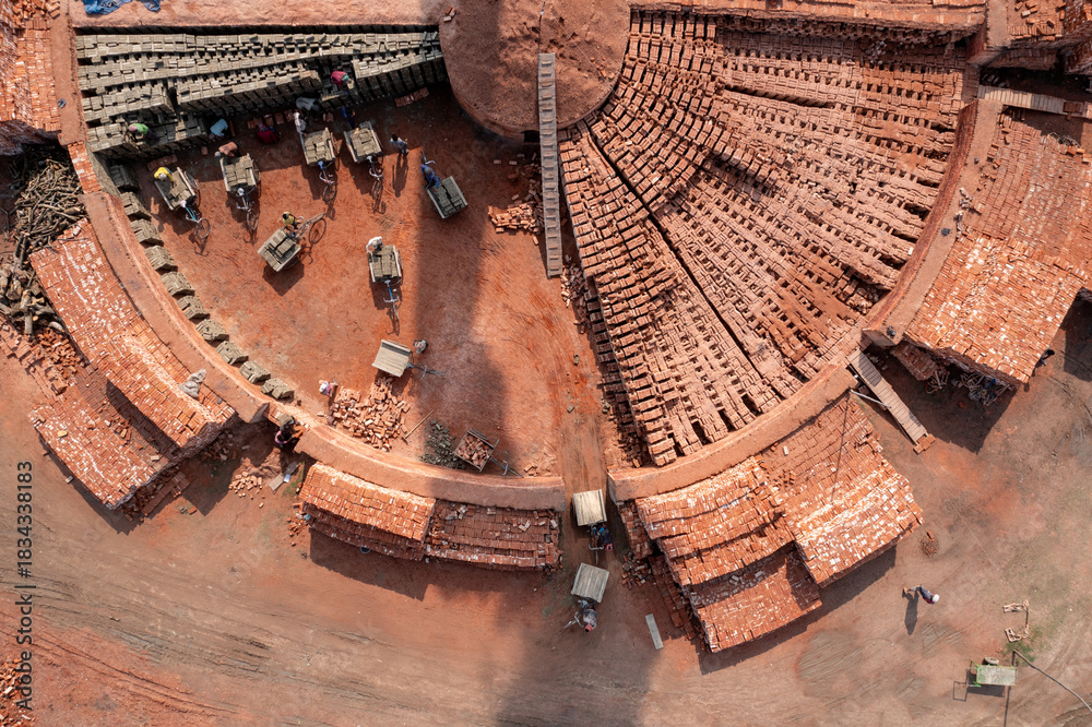 Aerial view of a brick kiln with its distinctive circular design ...