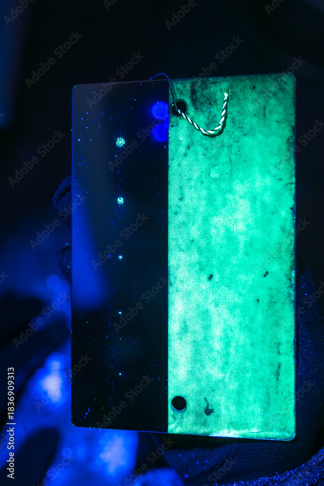 Stock-Foto „Fluorescent penetrant inspection TAM panel under ...