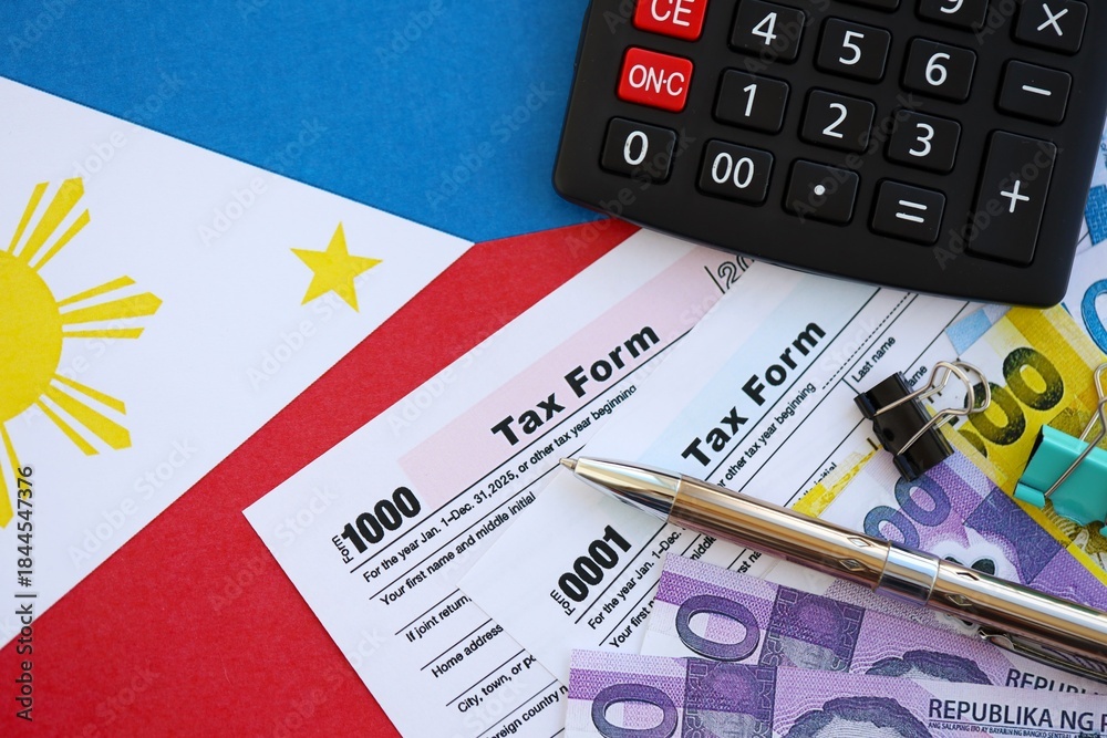 Stock-Foto „Philippines peso money bills and calculator with tax form ...