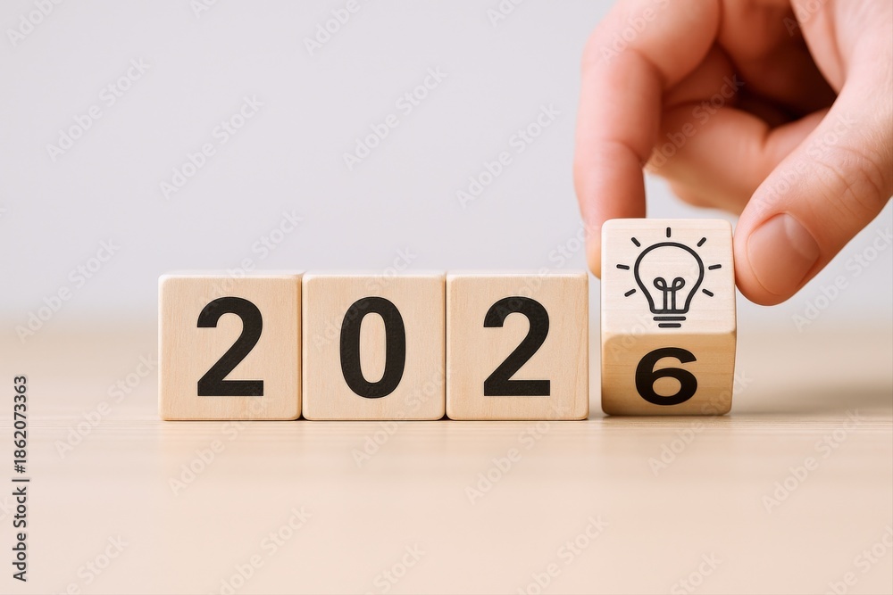 Photo Stock Concept of New Year 2026, Hand changing wooden cubes 2025 to 2026, planning and ...